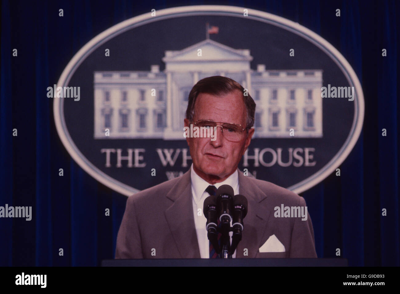 President George H.W. Bush carries hs dog Ranger to Marine One for a ...