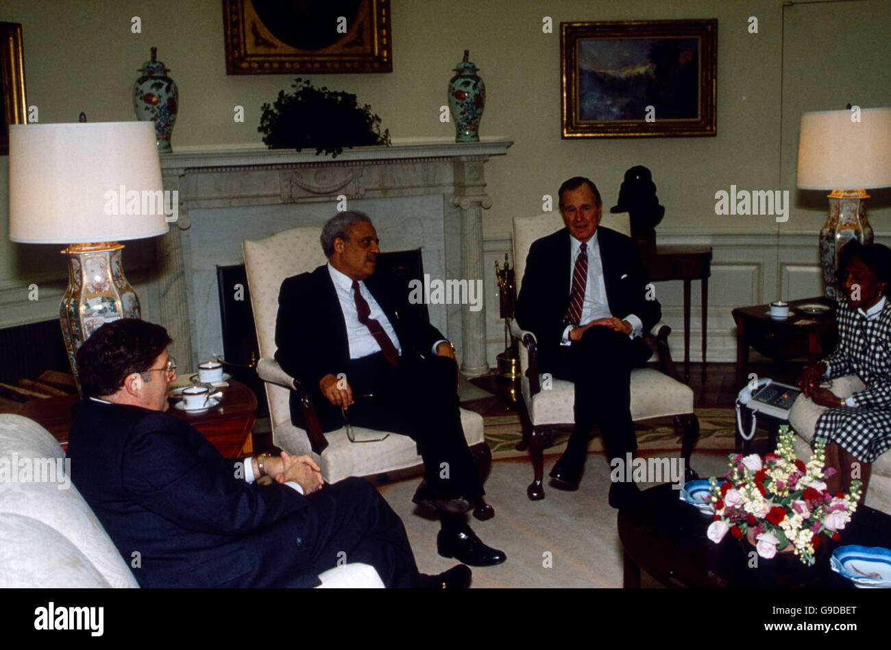 President George H.W. Bush carries hs dog Ranger to Marine One for a ...