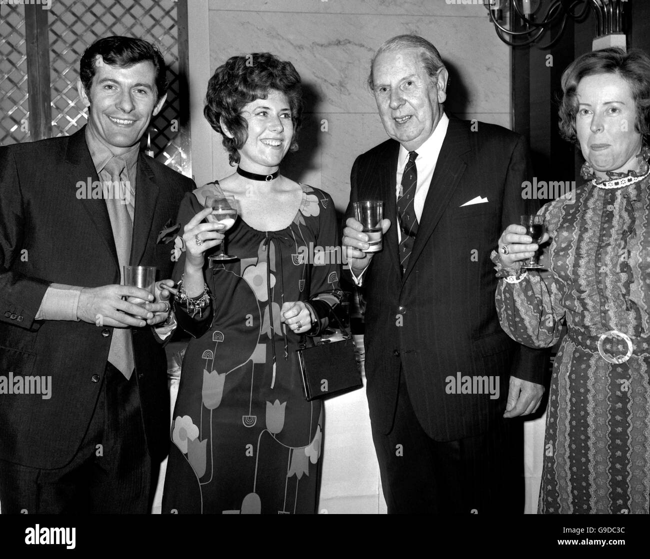 Mr and Mrs Alan Mullery (left) with Vice Chairman Mr Cox with his ...