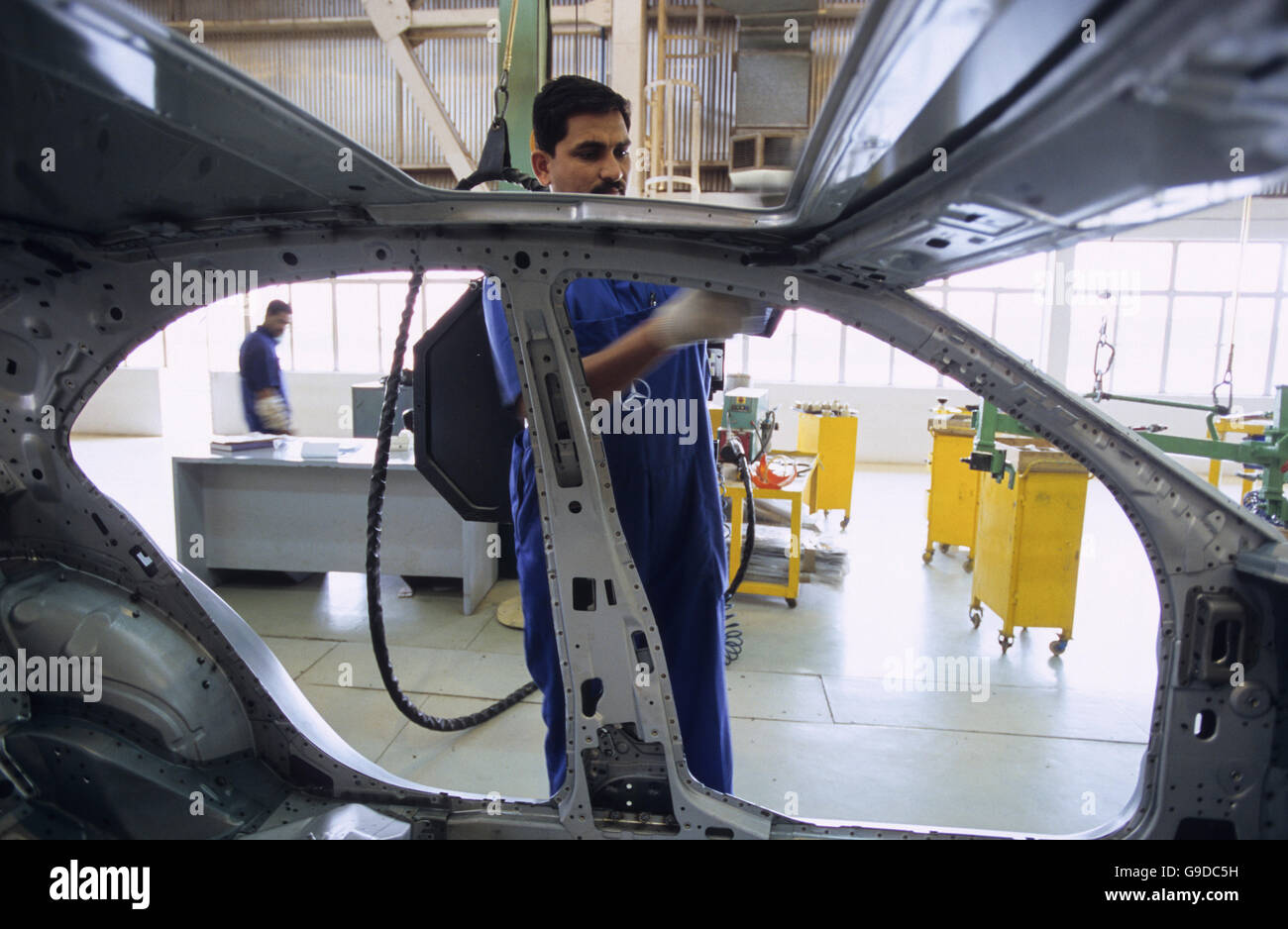 INDIA Maharashtra Pune, Daimler Chrysler Factory, assembly line for ...