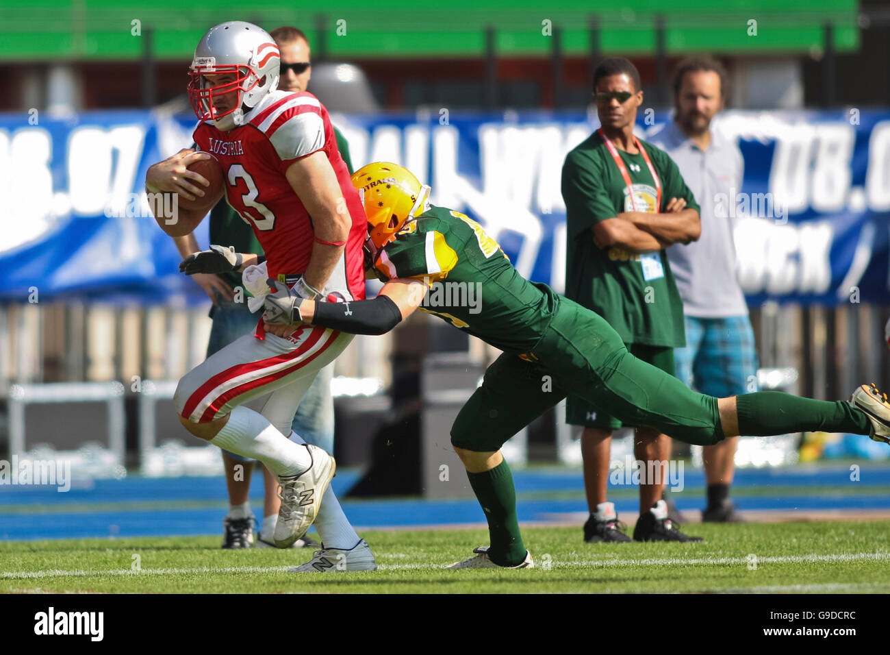 Thomas Haider, #13 Austria, is tackled at the Football World ...