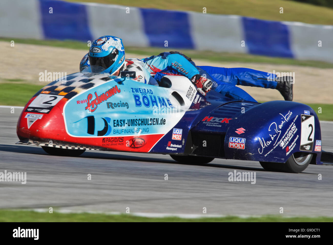 Motorcycle racers Mike Roscher and Danny Kamerbeek, Germany, compete in ...