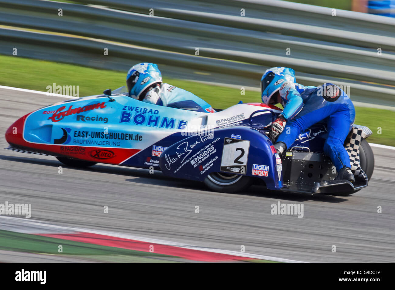 Motorcycle racers Mike Roscher and Danny Kamerbeek, Germany, compete in ...