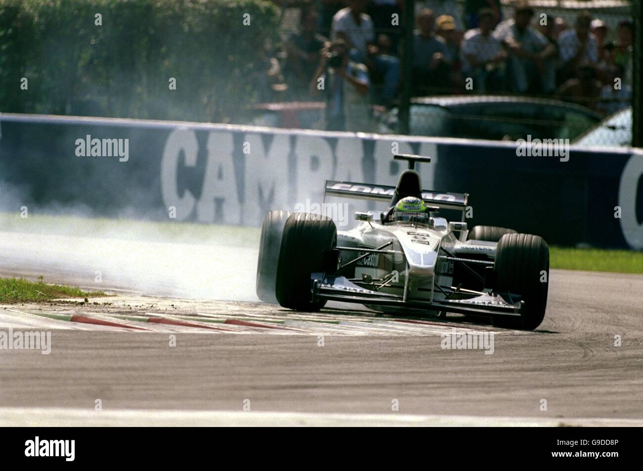 Action smoking tyres burning rubber front view f1 hi-res stock ...