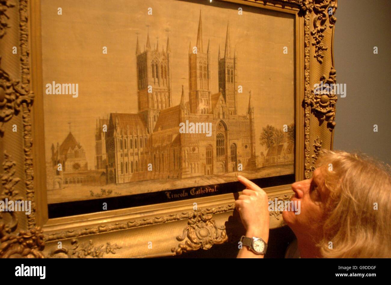 Essex artist Grayson Perry inspects a picture of Lincoln Cathedral made ...
