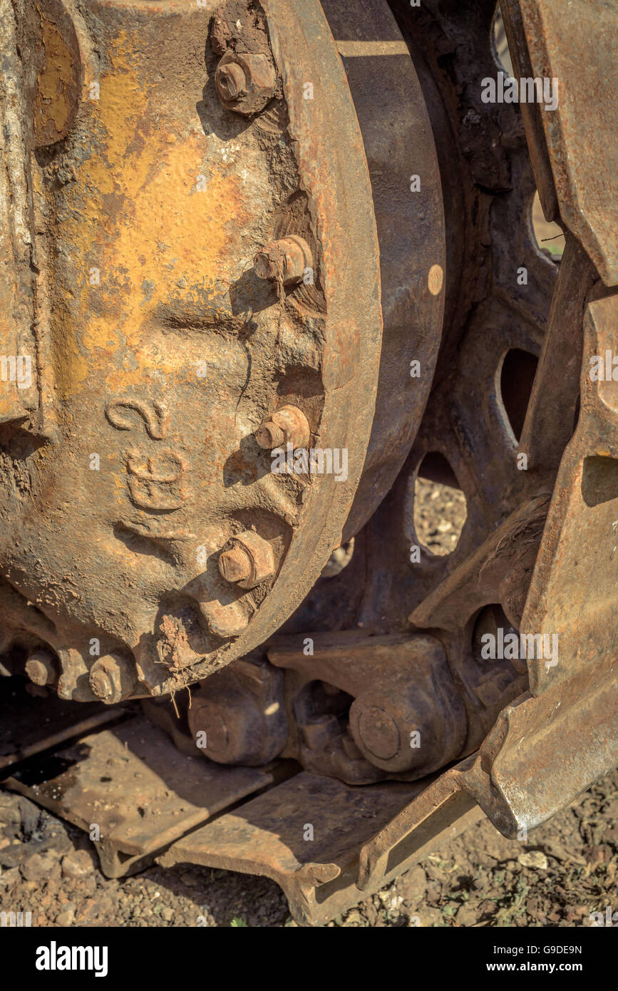 Aged abandoned industrial machine with corroded dirt stained ...