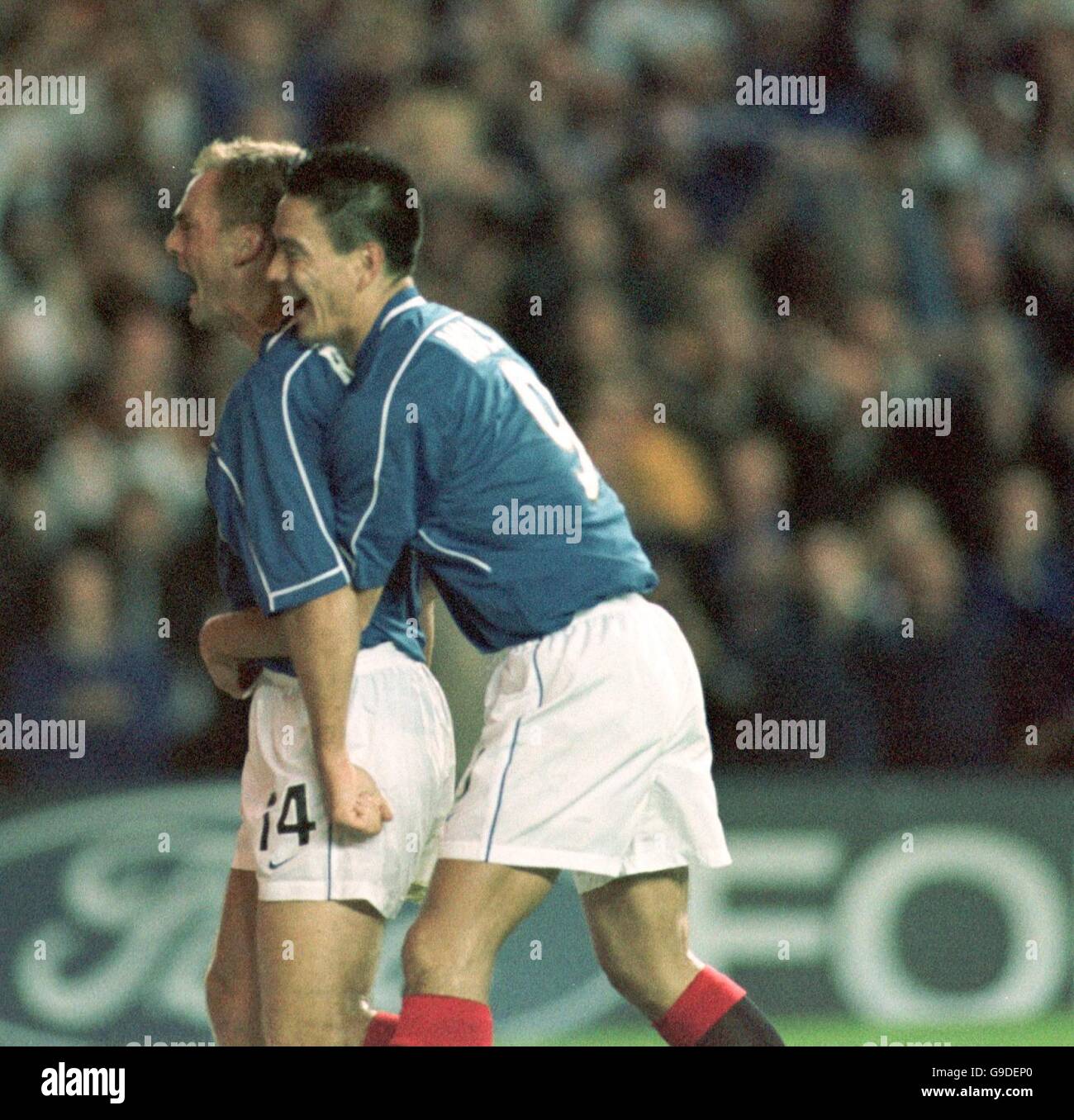 Rangers' Ronald De Boer (l) celebrates the second goal with teammate ...