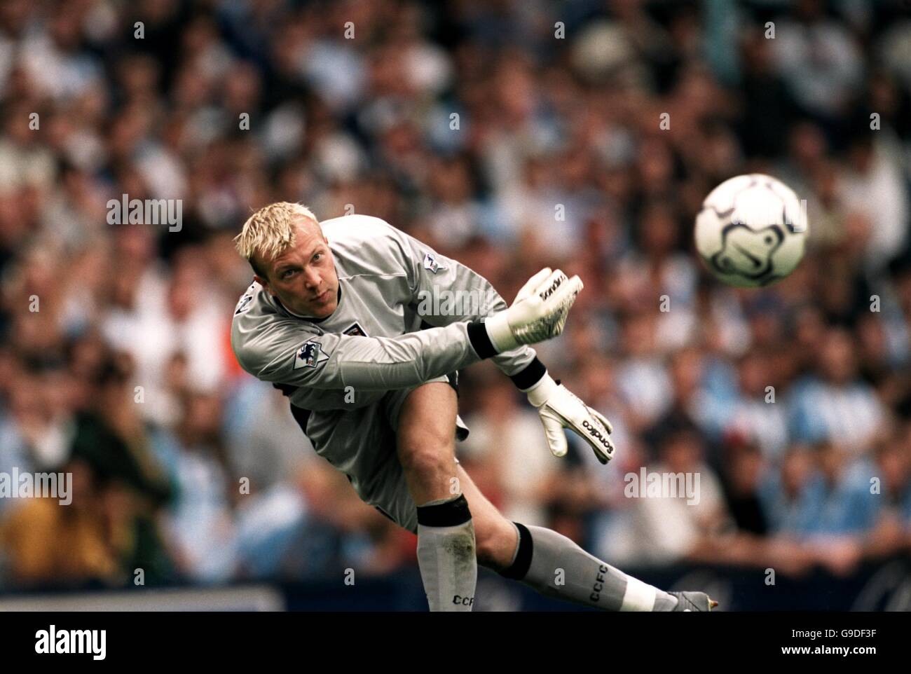 Coventry City goalkeeper Magnus Hedman rolls the ball out Stock Photo ...