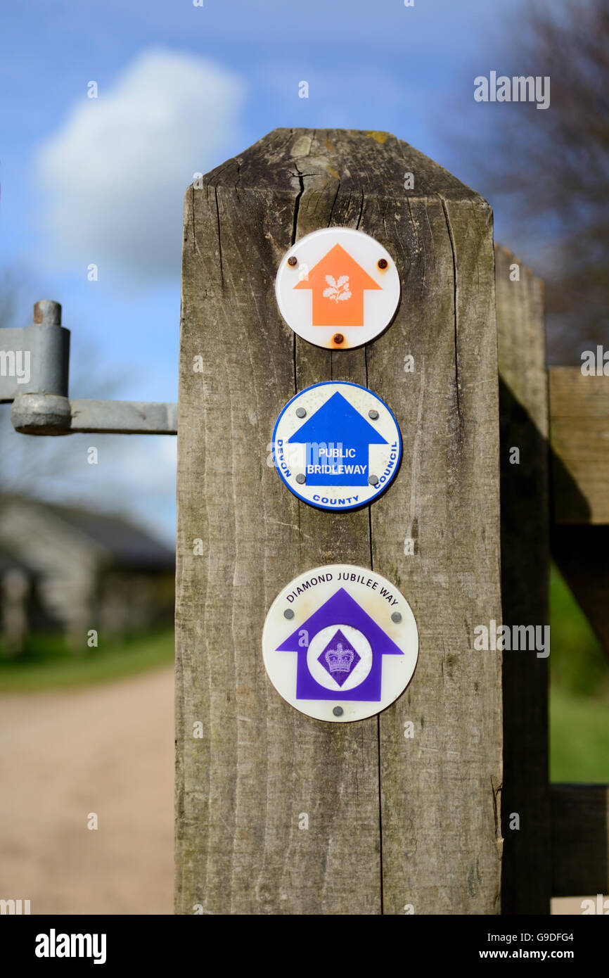 Three waymarkers on a gate post Stock Photo - Alamy