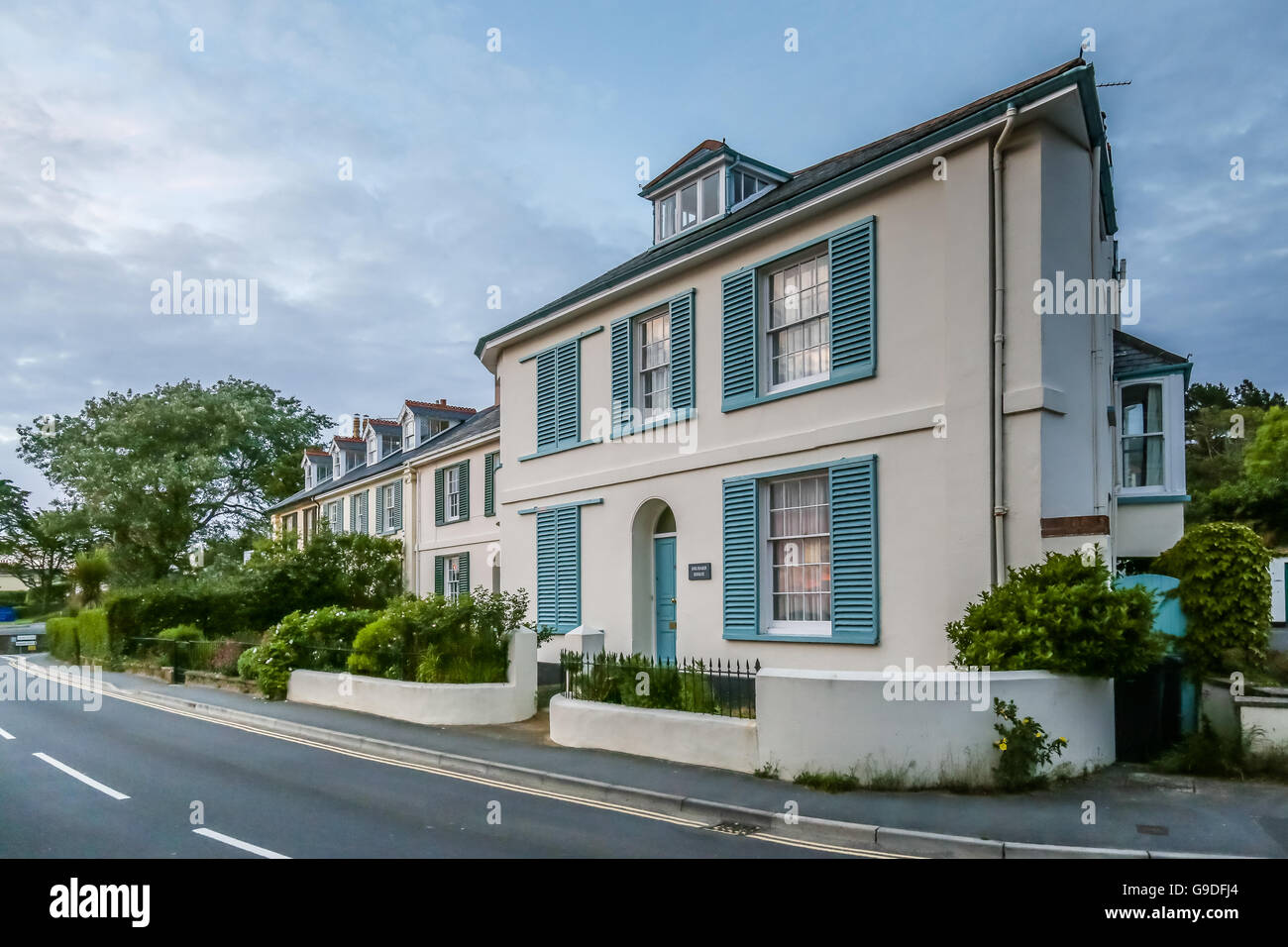 Victorian seaside villas in a coastal town at sunset Stock Photo - Alamy