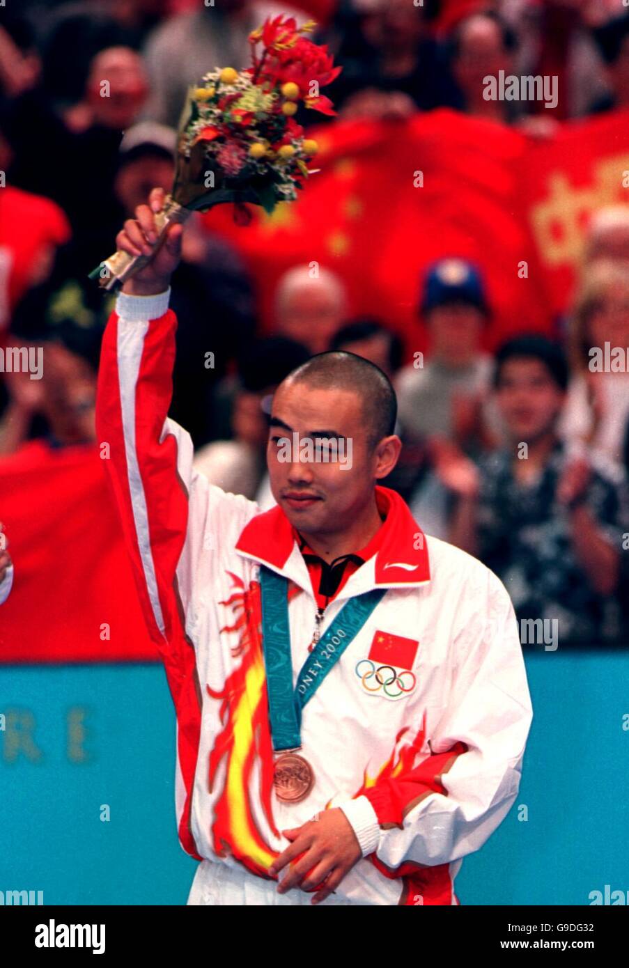 Chinas guoliang liu acknowledges the crowd after winning bronze hi-res ...