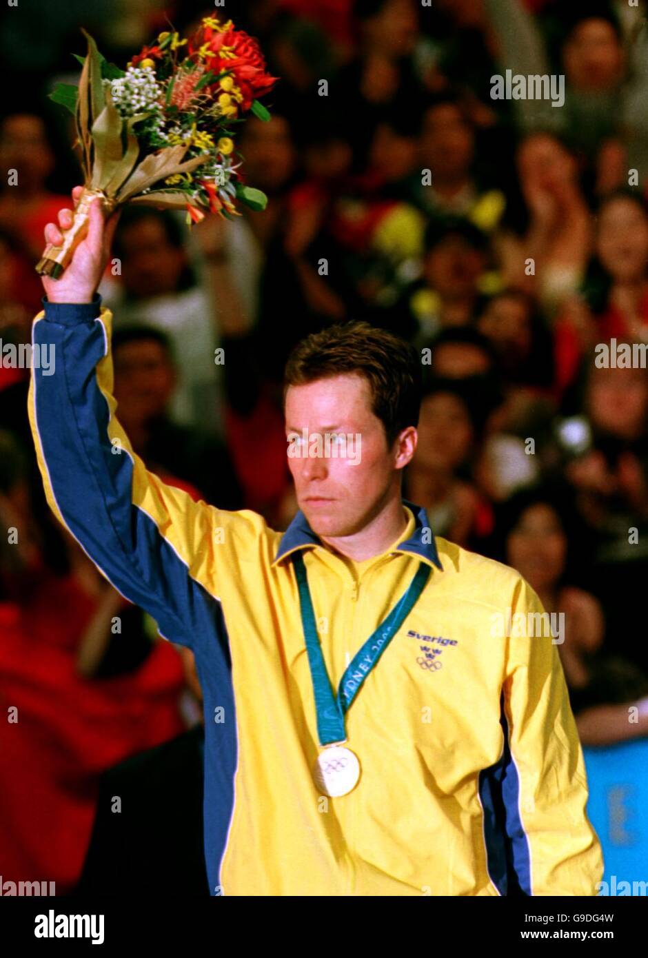 Swedens jan ove waldner acknowledges the crowd after winning silver ...