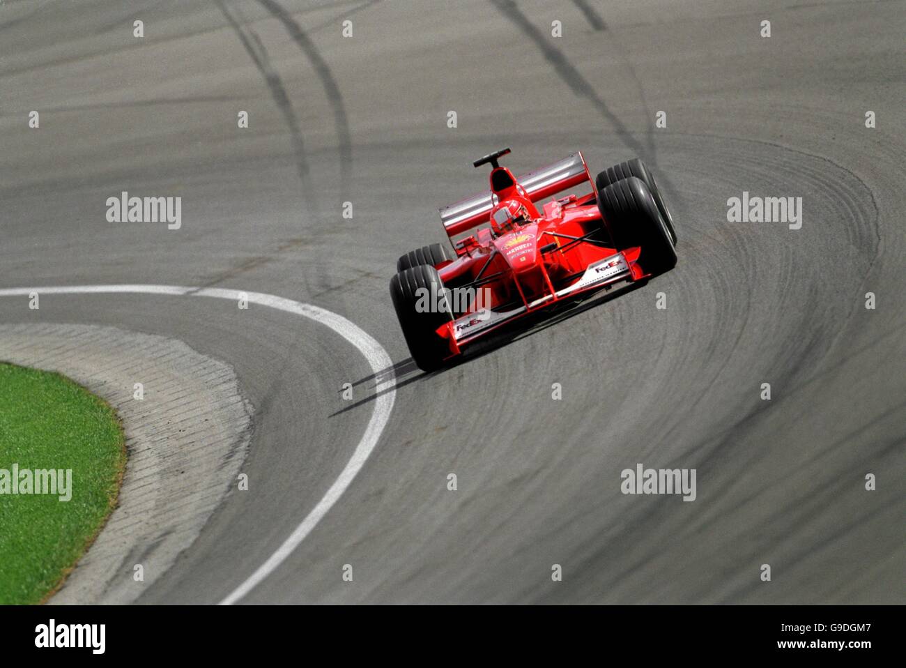 Michael schumacher in action on indianapoliss banked circuit hi-res ...