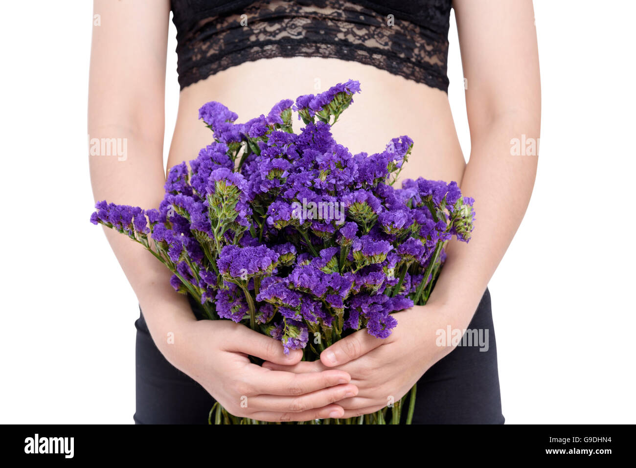 Pregnant woman and flower with photo filter Stock Photo - Alamy