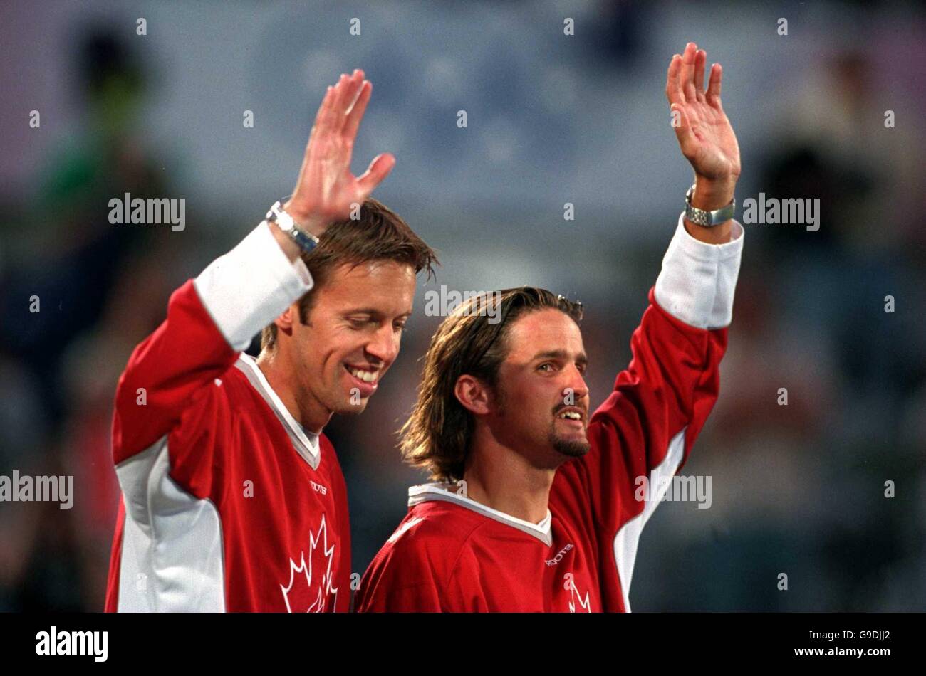 Gold medalists daniel sebastien lareau wave to the crowd hi-res stock ...