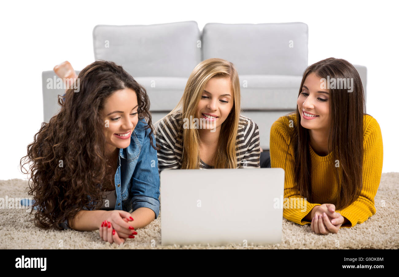 Happy teen girls home laptop hi-res stock photography and images - Alamy