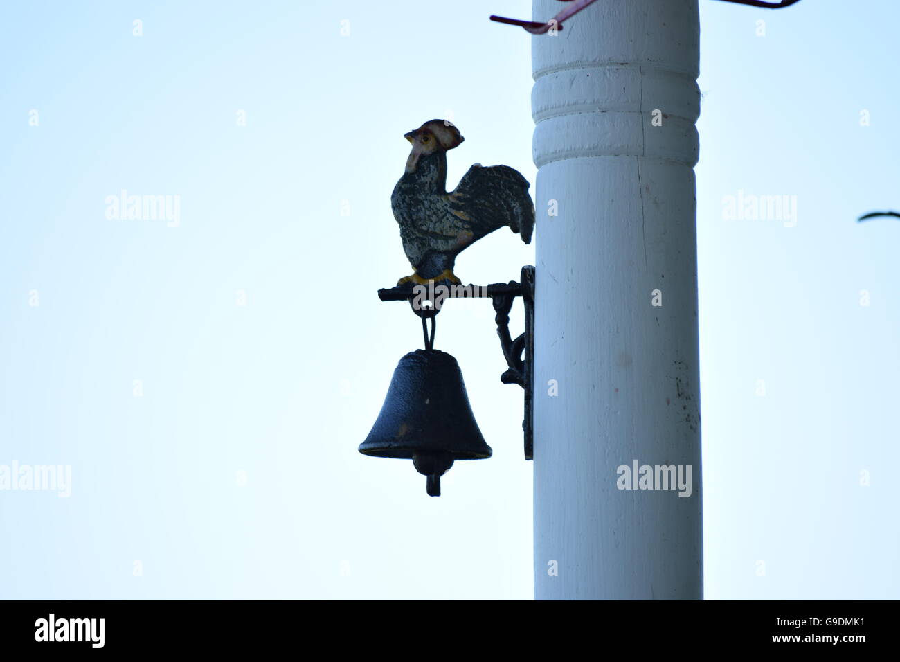 Cast iron chicken bell Stock Photo - Alamy