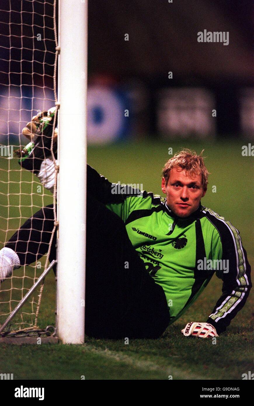 FC Copenhagen goalkeeper Michael Stensgaard untangles himself from the ...