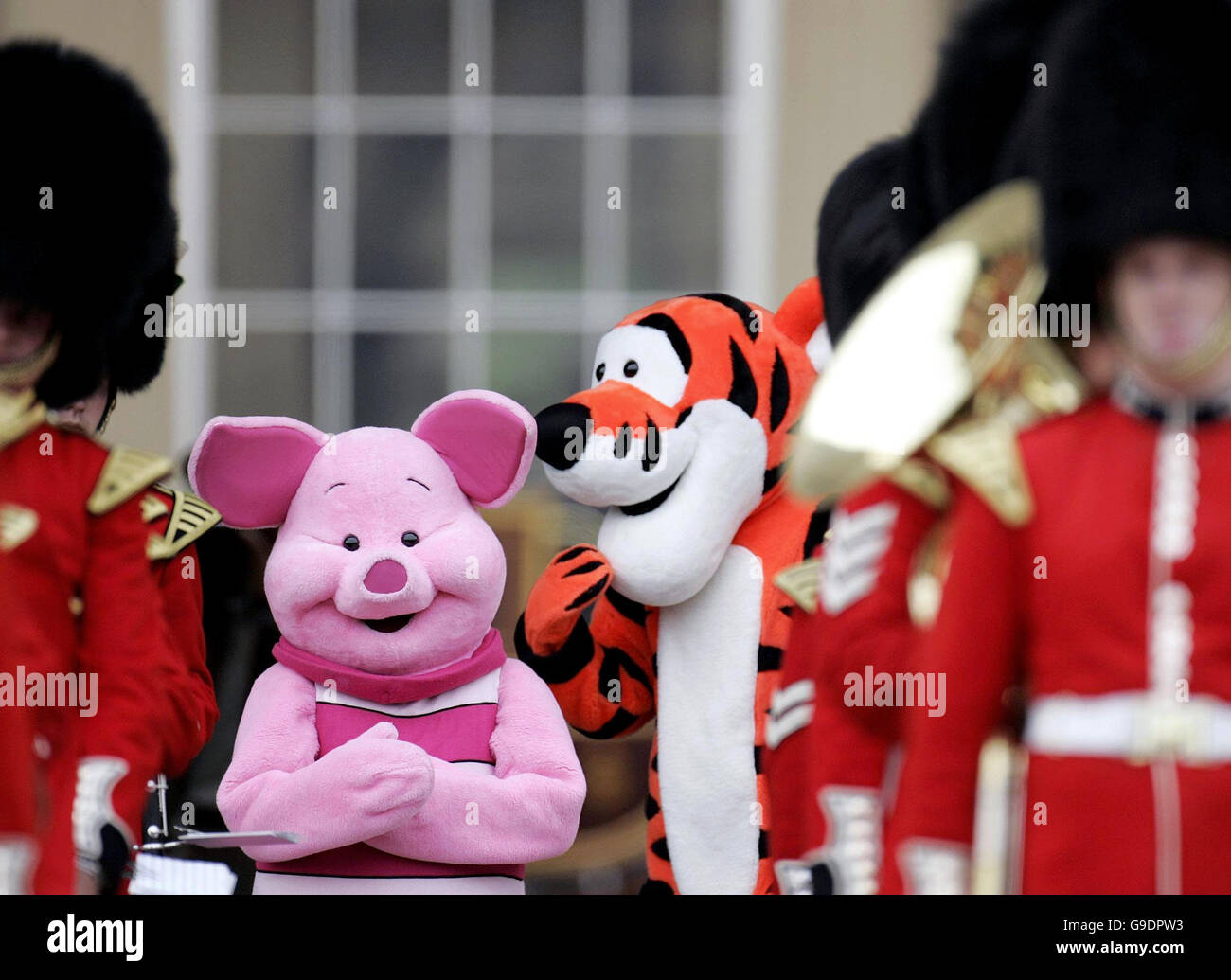 Piglet and Tigger join the band in the forecourt of Buckingham Palace ...