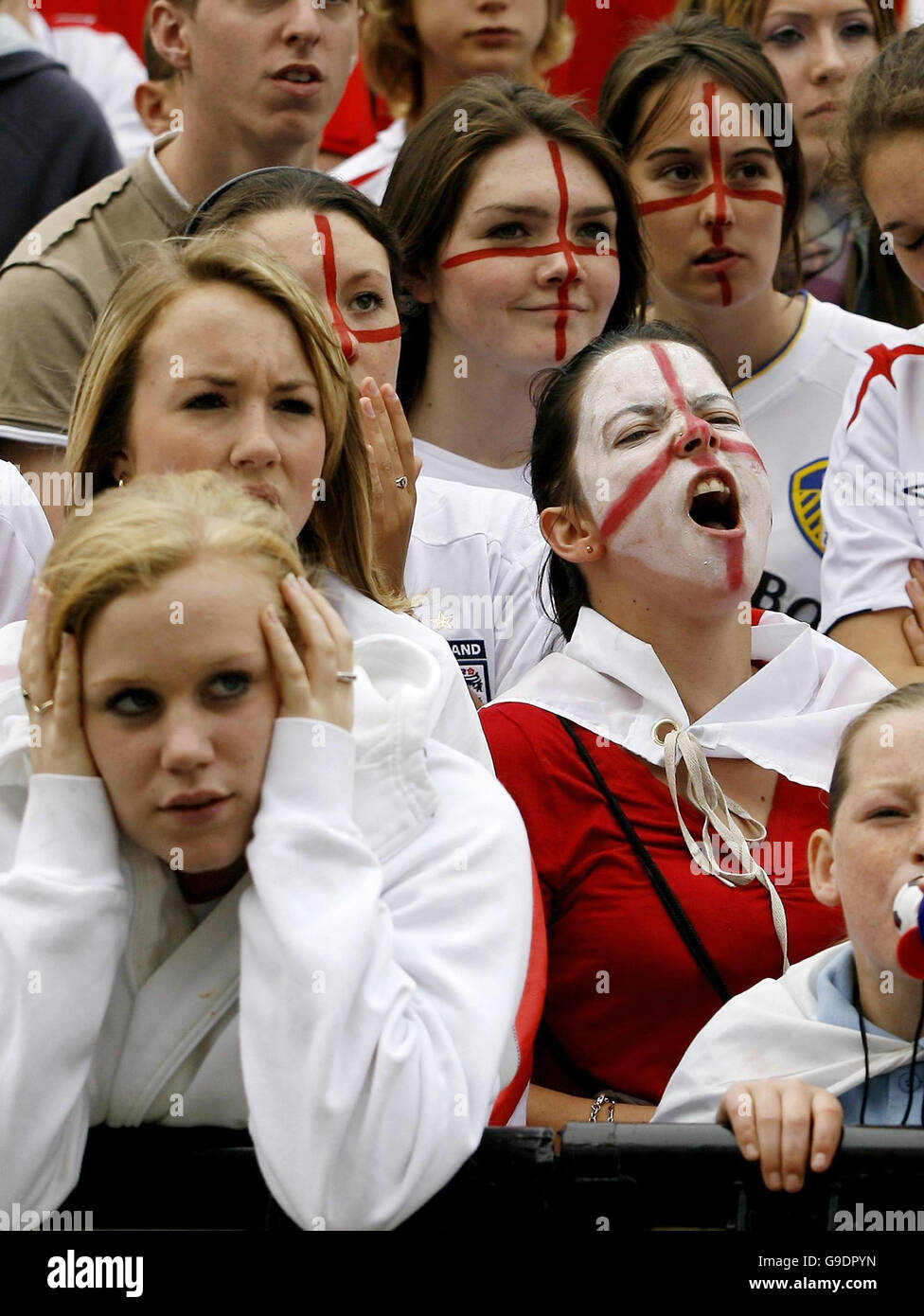 England football fans watch a missed chance during their team's World ...