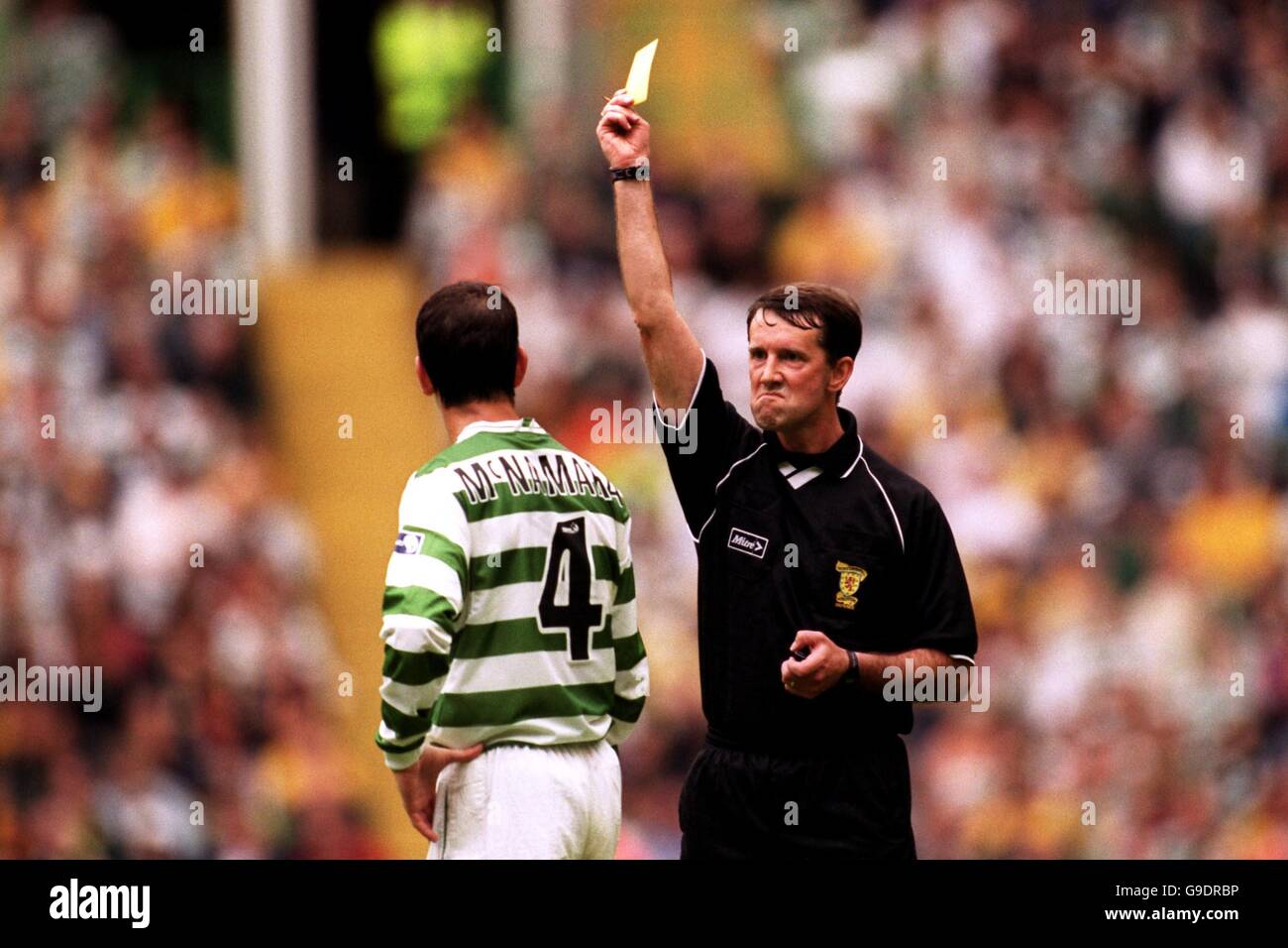 Ref referee booking yellow card grumpy frown football hi-res stock ...