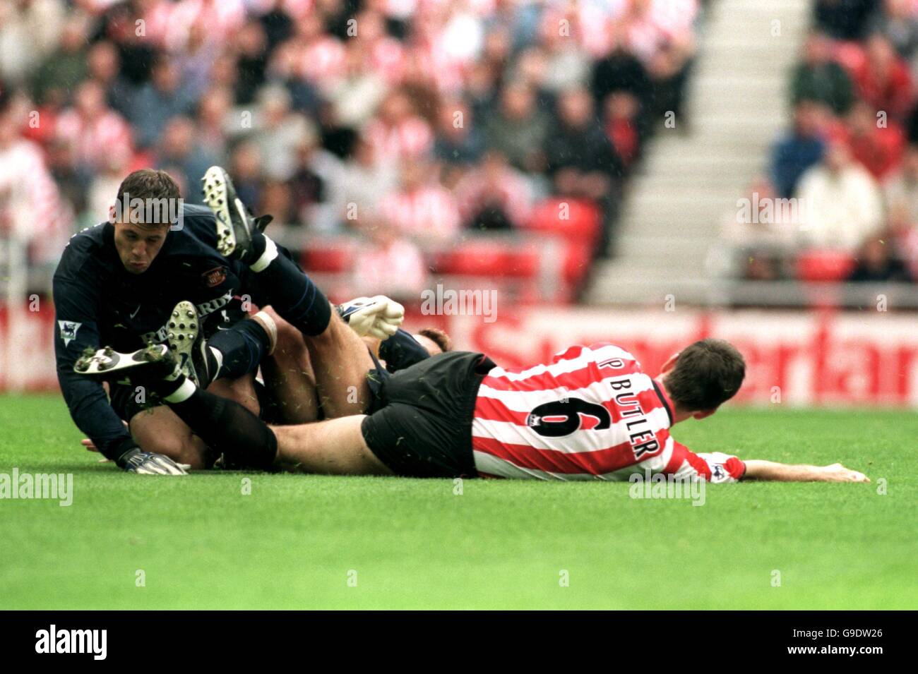 Football action thomas butler hi-res stock photography and images - Alamy