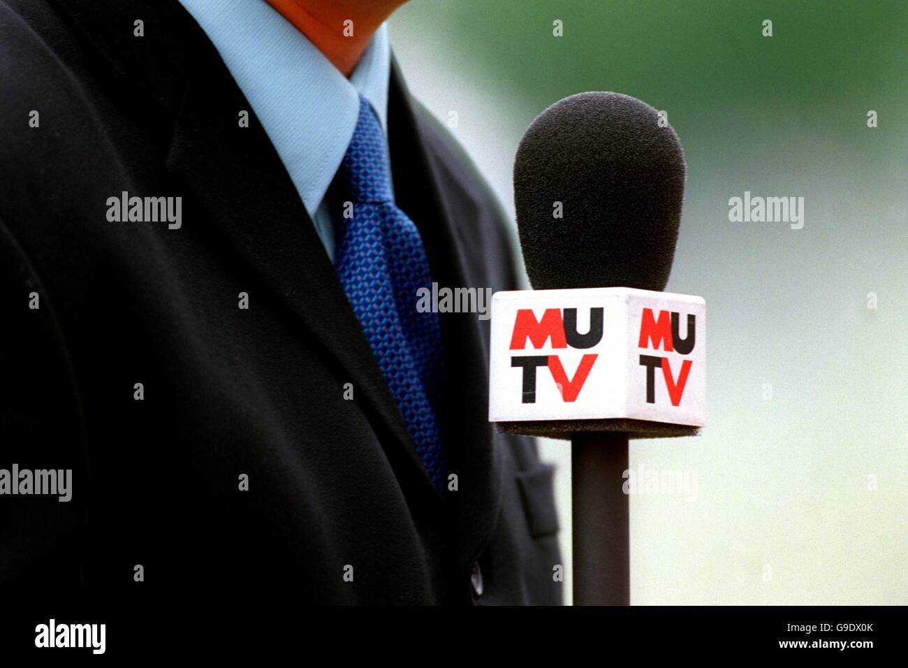 A reporter from Manchester United TV waits to see who United will face ...