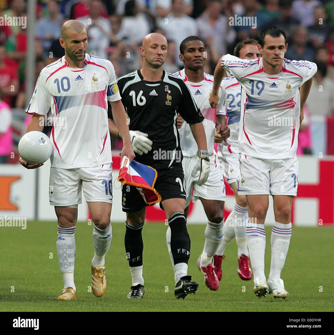 French captain Zinedine Zidane (L) leads his team into action Stock ...