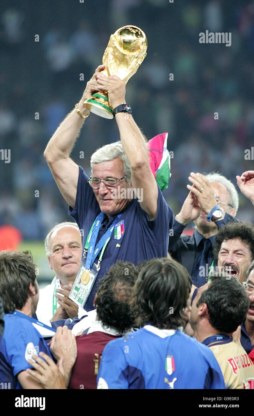 Italys marcelo lippi celebrates with the trophy hi-res stock ...