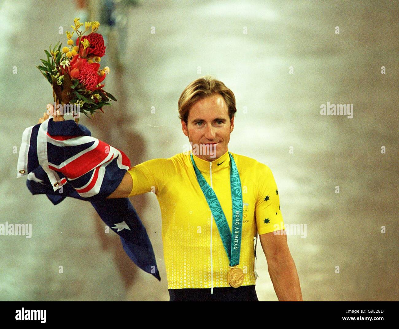 Australia's Brett Aitken celebrates his gold medal in the 12 sprint ...