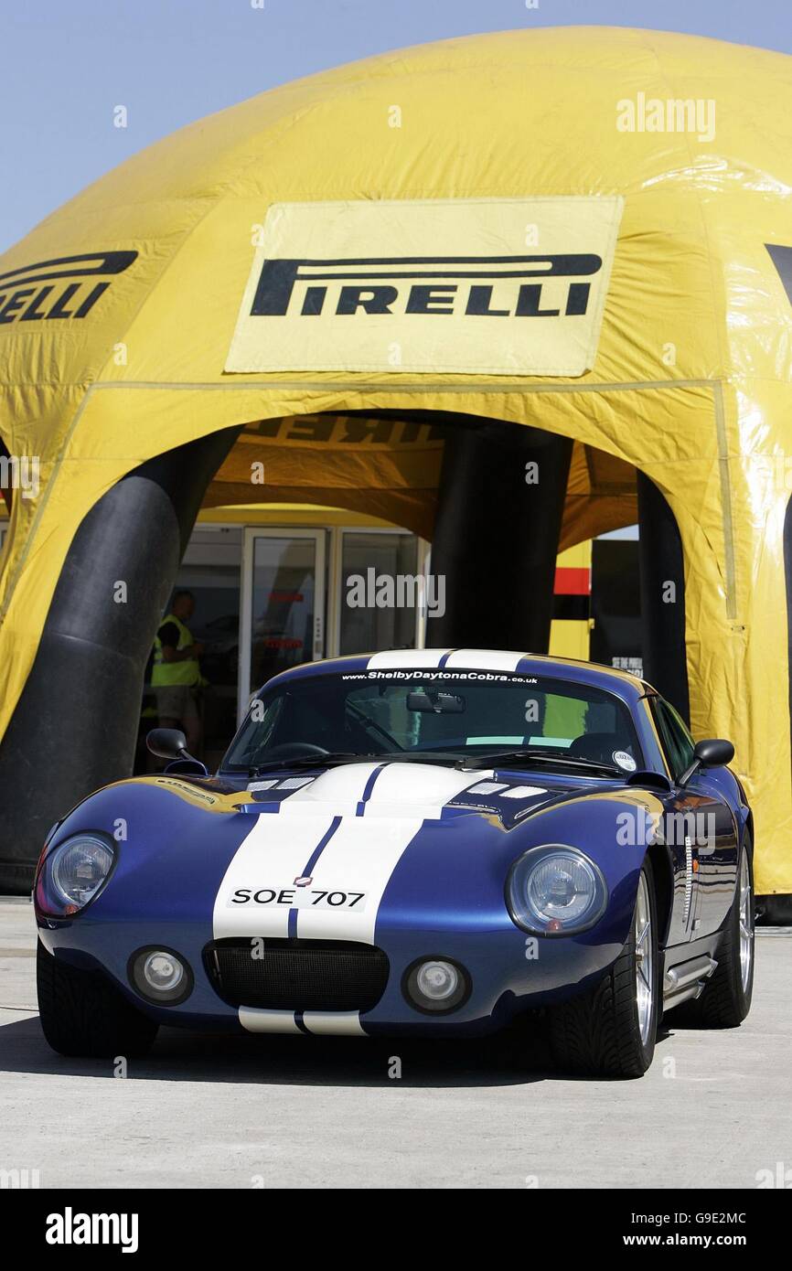 A Shelby Daytona Cobra is parked on the runway at London City Airport ...