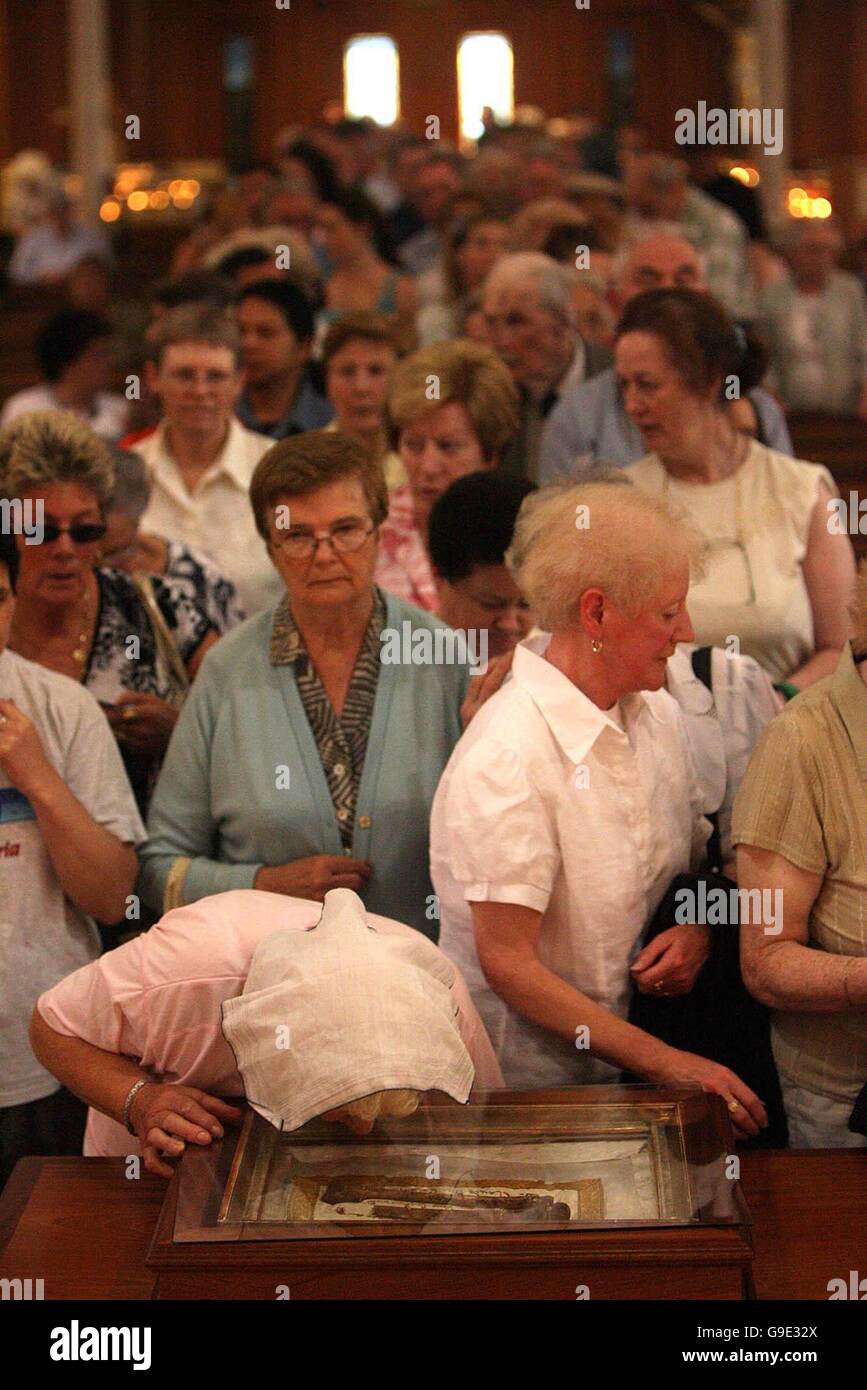 Catholics queue to view the relics of the 17th century French Jesuit St ...