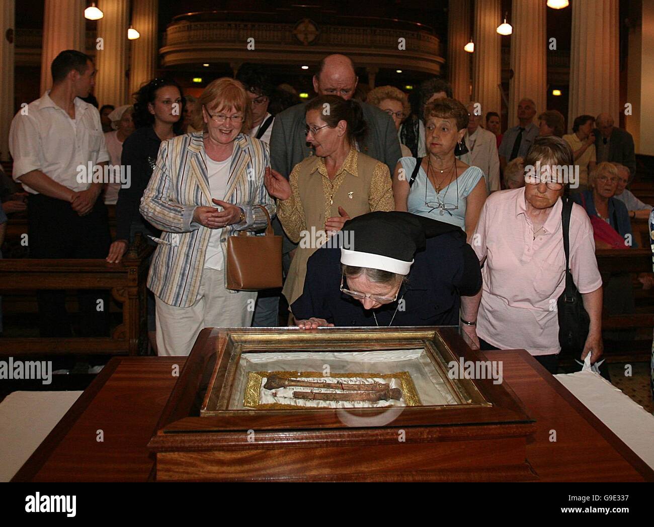 Catholics queue to view the relics of the 17th century French Jesuit St ...