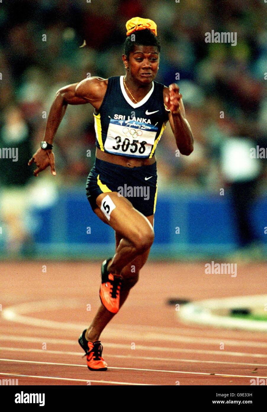 Sri lankas susanthika jayasinghe in action during her 100m heat hi-res ...