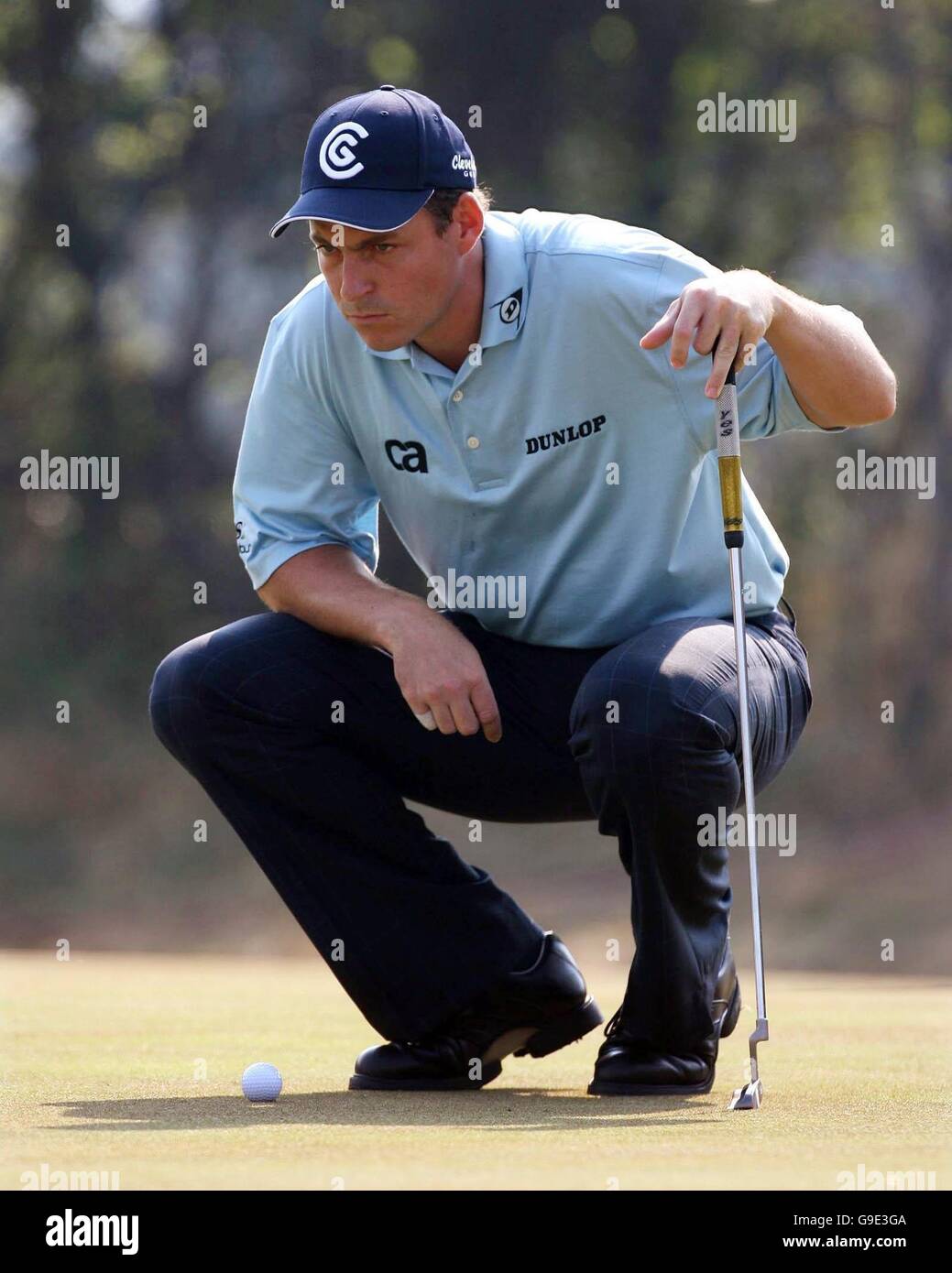 England's David Howell lines up a put on the fourth green during the ...