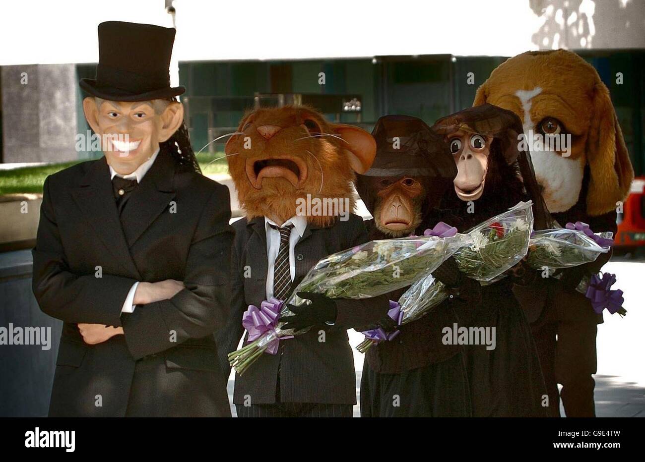Members of the anti-animal experimentation group BUAV stage a mock ...