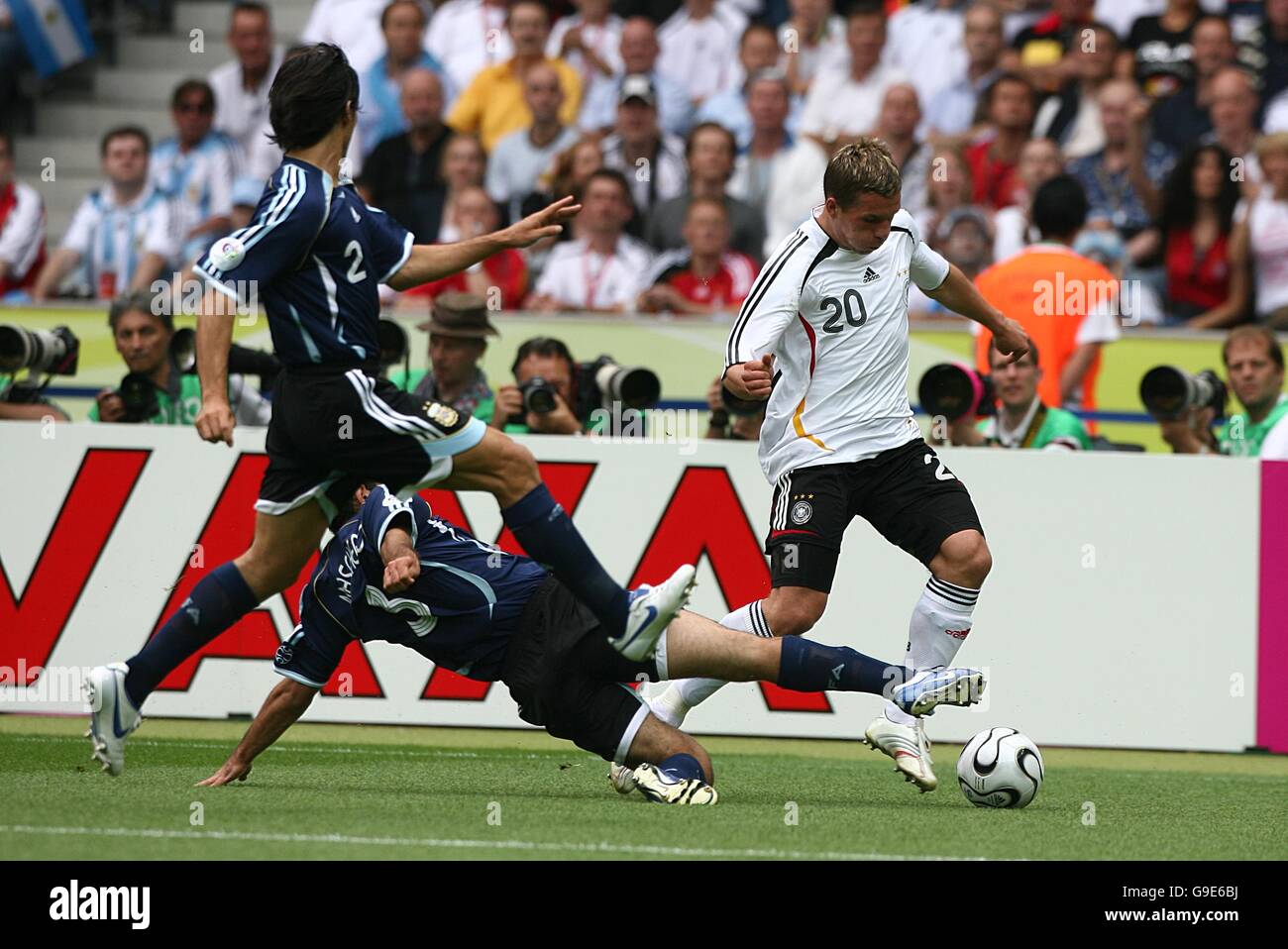 Argentina's Javier Mascherano and Roberto Ayala challenge Germany's ...