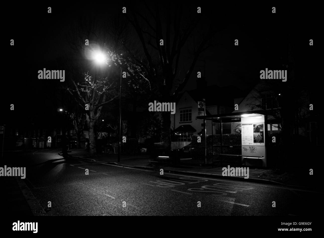 Dark bus stop London Stock Photo - Alamy