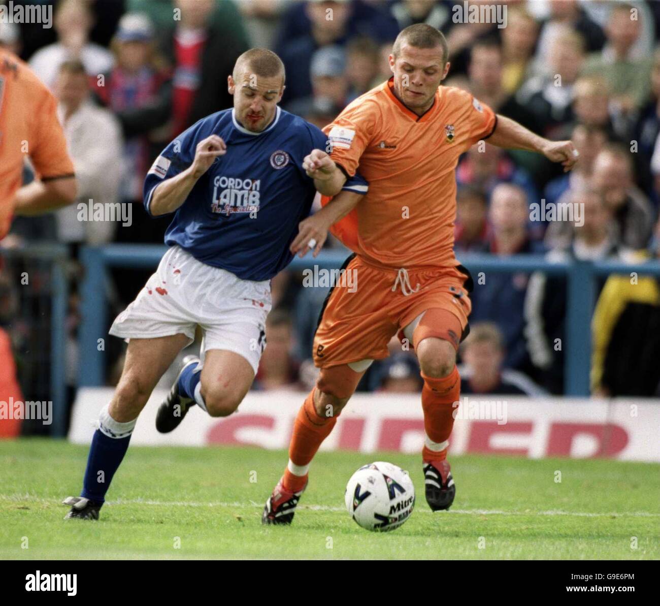 (L-R) Chesterfield's Sean Parrish jostles with Barnet's Sam Stockley as ...