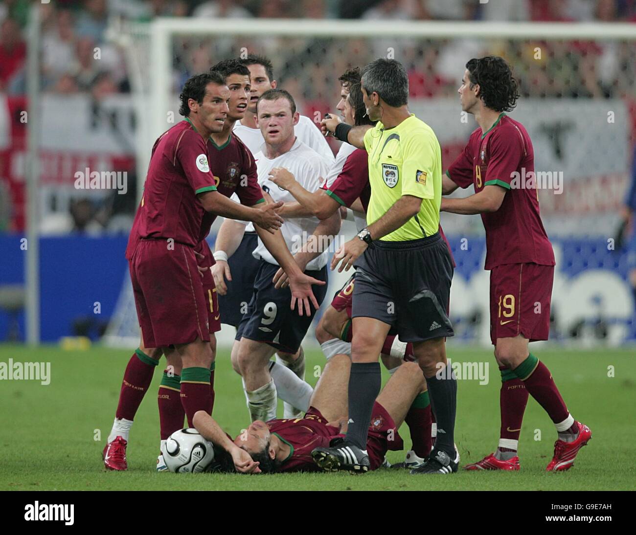 Referee Horacio Marcelo Elizondo points to England's Wayne Rooney ...