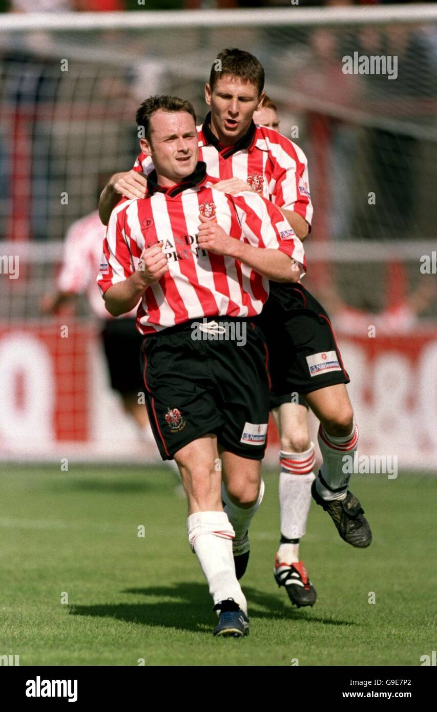 Leigh RMI's Tony Black (l) celebrates scoring his team's first ever ...