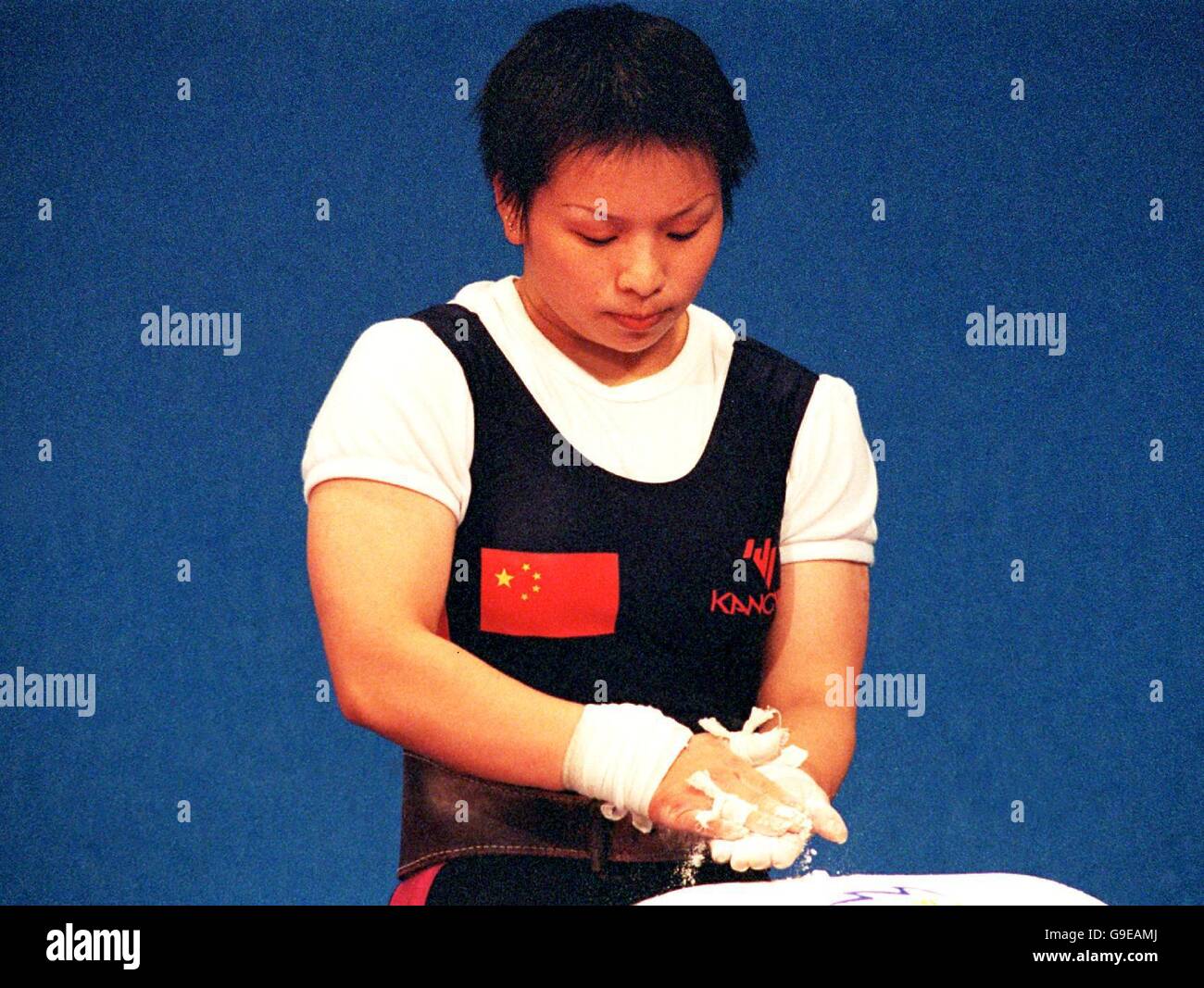 Xia Yang of China prepares to win gold with a new World and Olympic ...