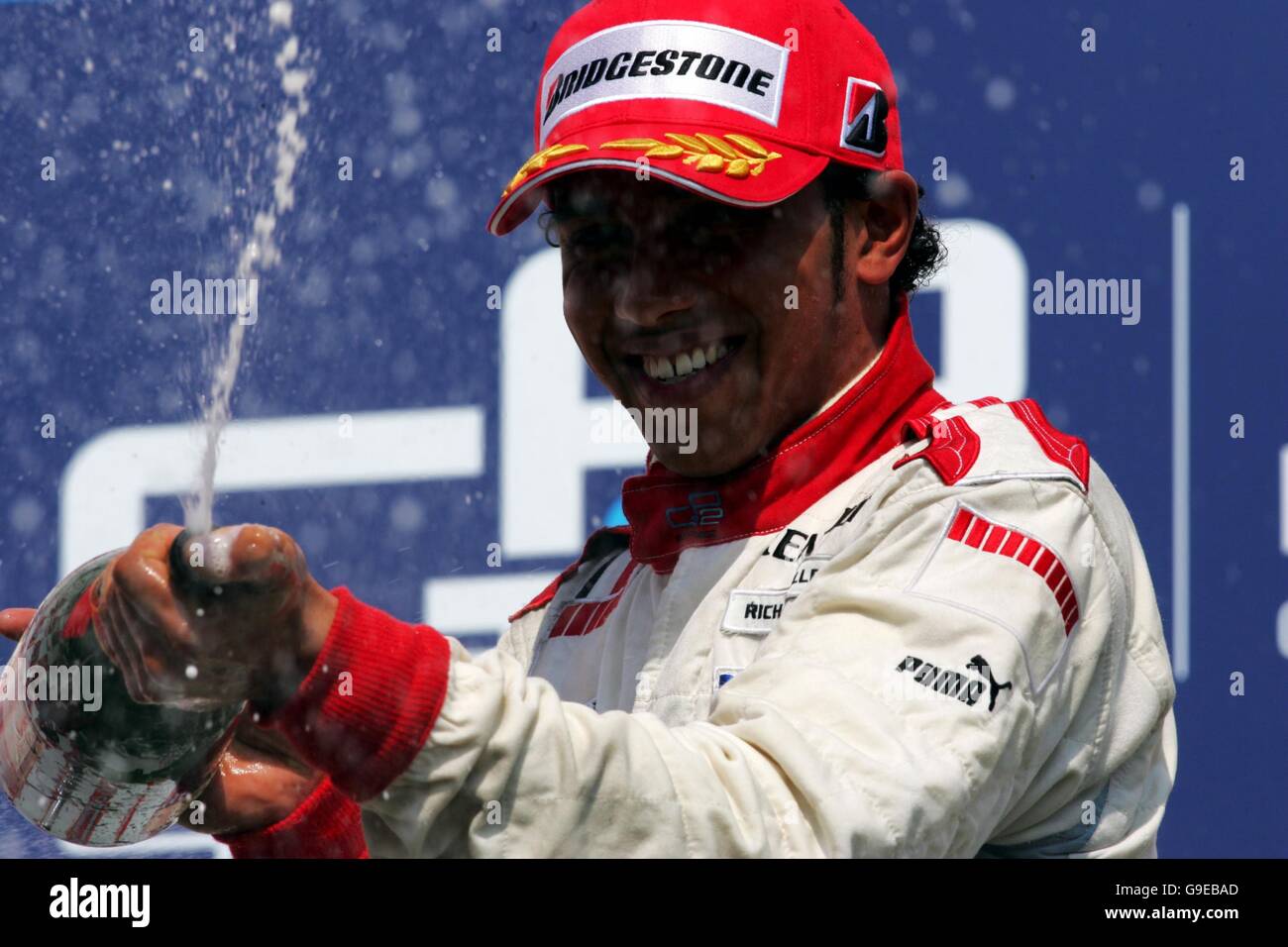 Race winner Lewis Hamilton (GBR) celebrates on the podium ... Motor ...