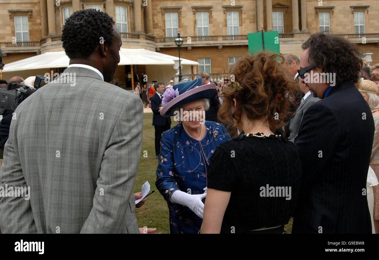 Queen Elizabeth II meets guests (left to right) Linford Christie ...
