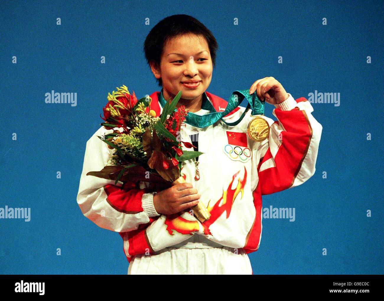 China's Xia Yang celebrates her World and Olympic record that secured ...