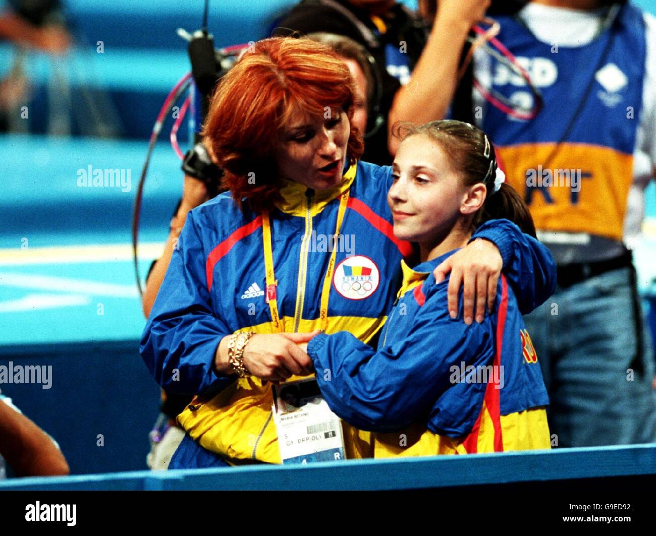 Romanias andreea raducan celebrates winning gold with her coach hi-res ...
