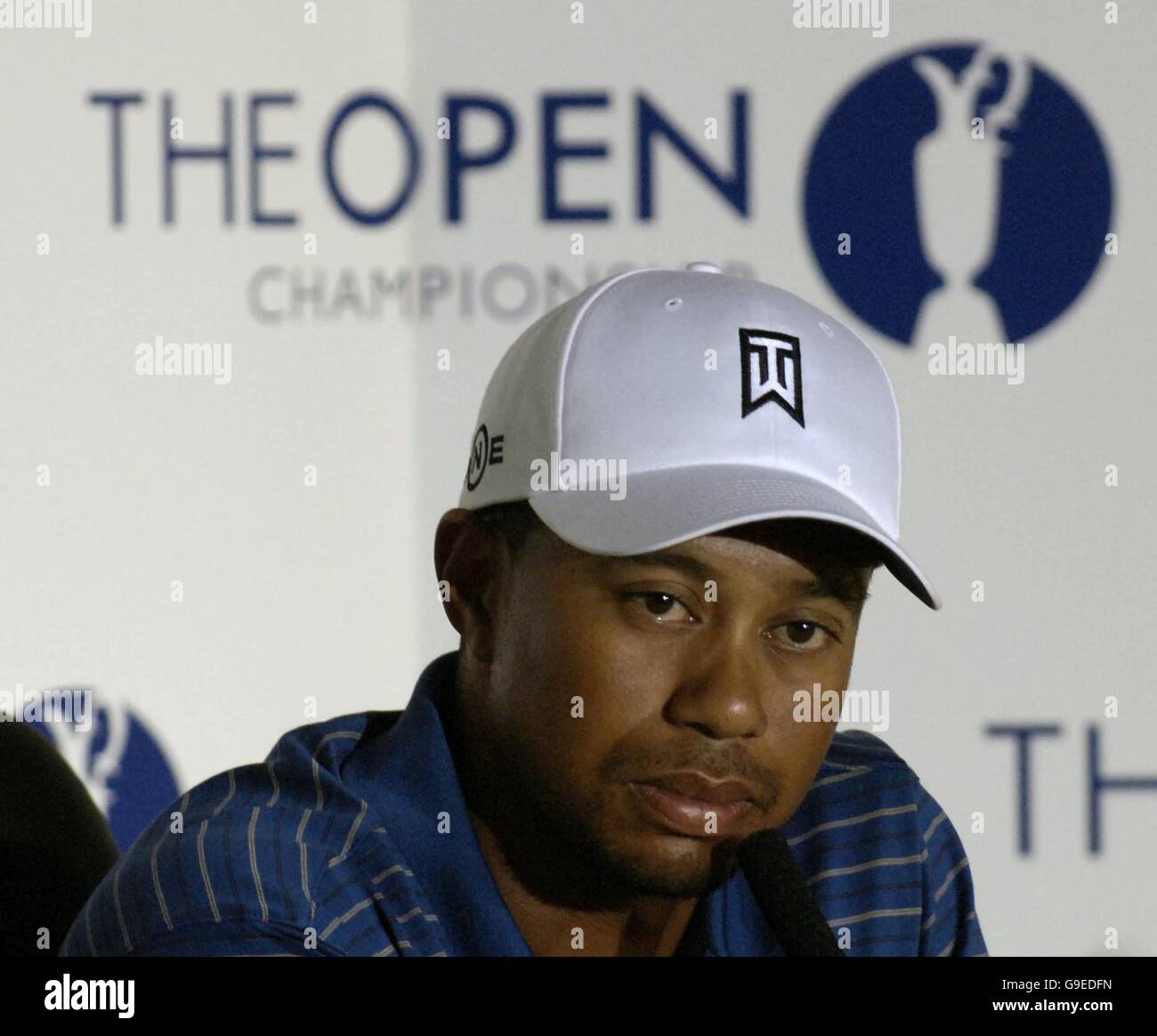 USA's Tiger Woods looks sad when his late father Earl is mentioned ...