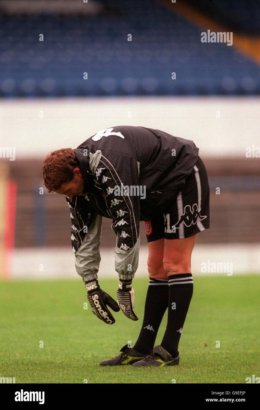 Wales goalkeeper Mark Crossley struggles to touch his toes Stock Photo ...