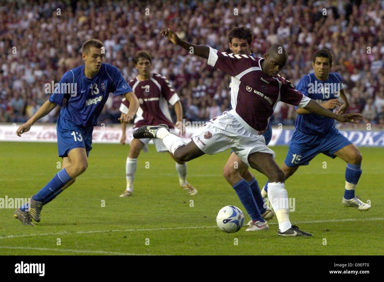 Heart's Ibrahim Tall (centre) scores during the Champions League second ...