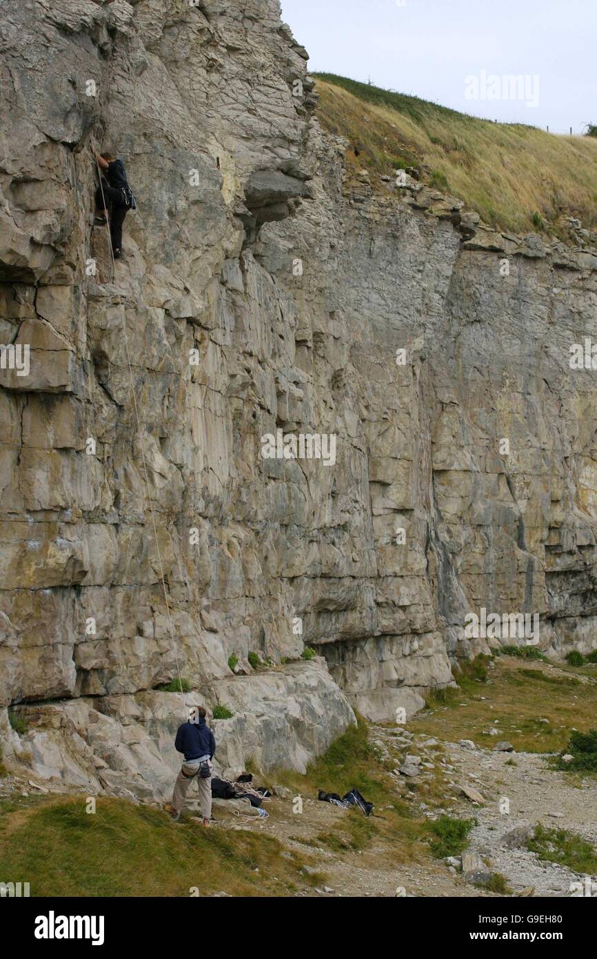 Climbing over ledge hi-res stock photography and images - Alamy